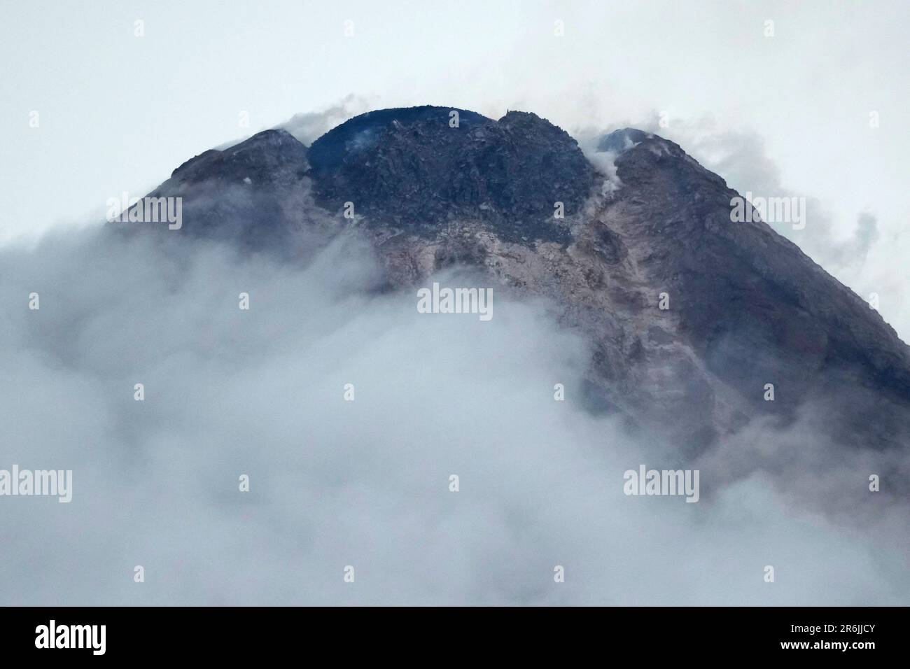 The summit of the Mayon Volcano is seen from Bonga, Albay province ...