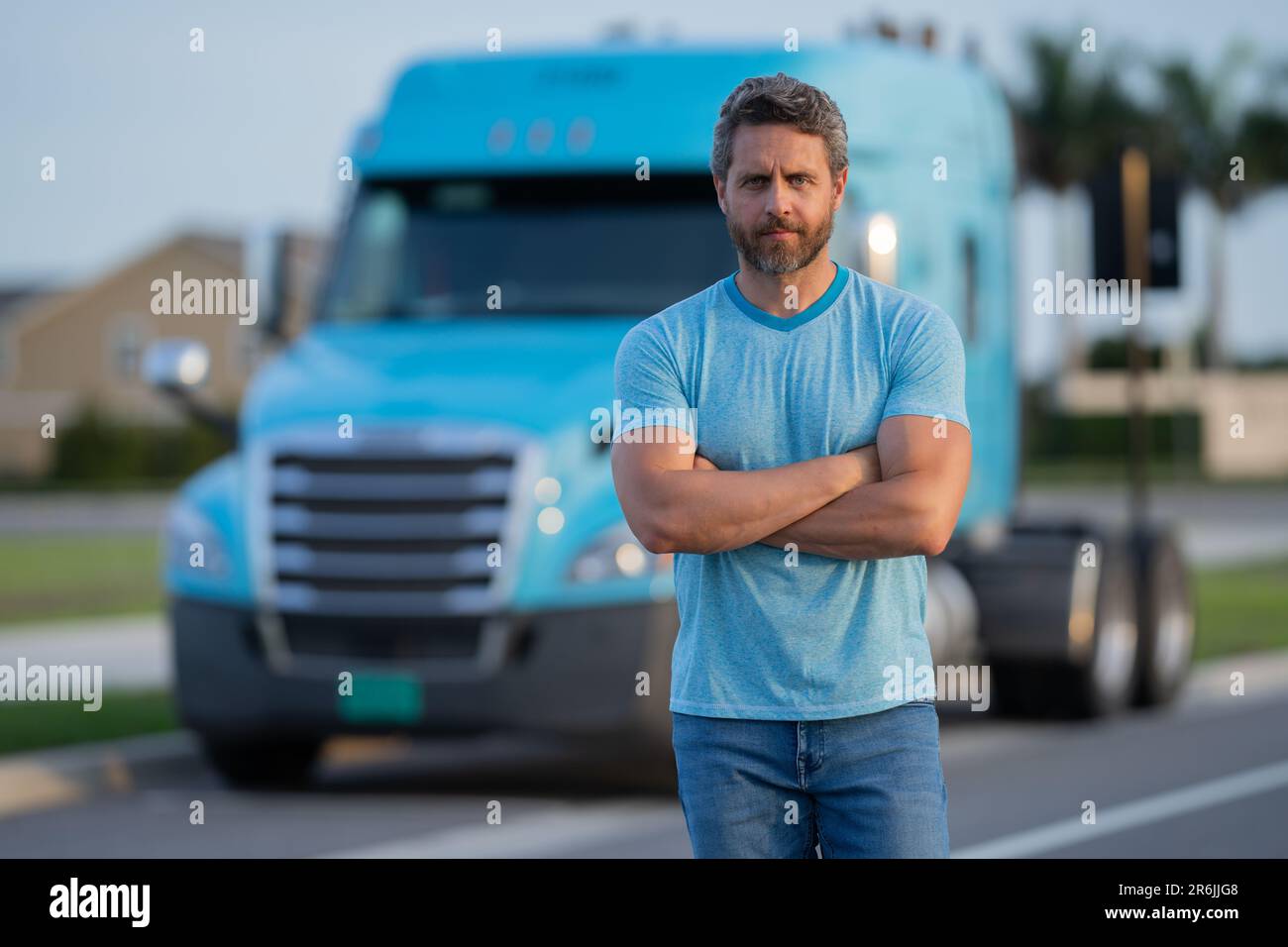Men driver near lorry truck. Man owner truck driver in t-shirt near ...