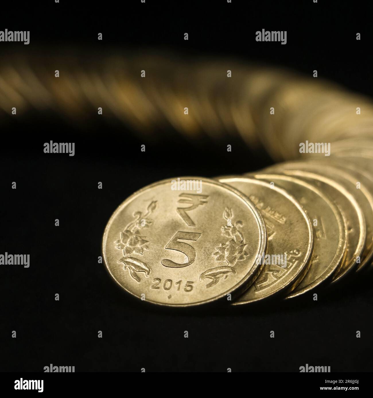 antique indian gold 5 (five) rupee coins arranged in a row shaped like ...