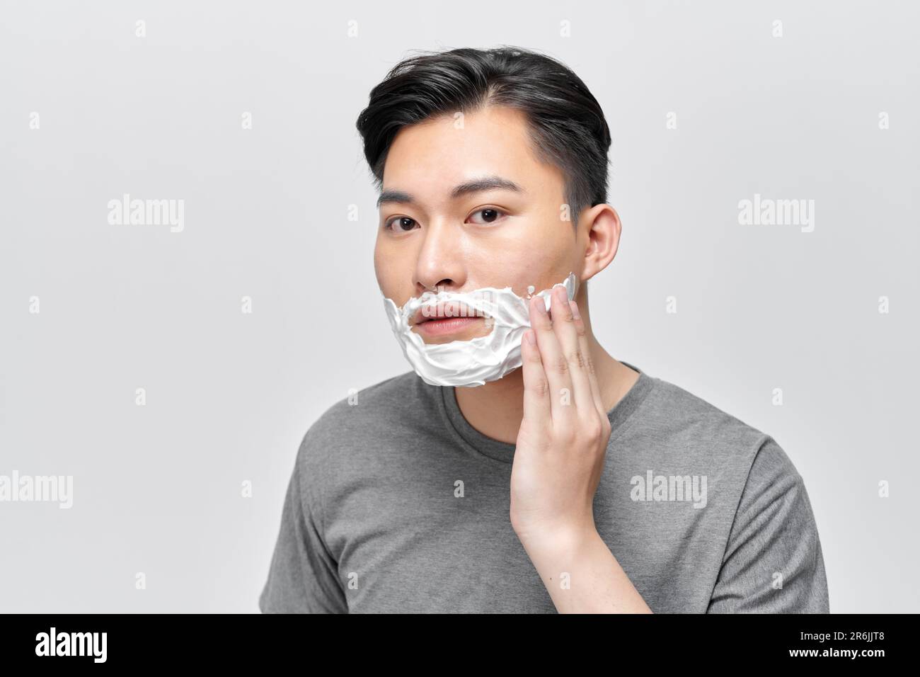 Shaving cream on face, hair and skincare for happy male model grooming Stock Photo - Alamy