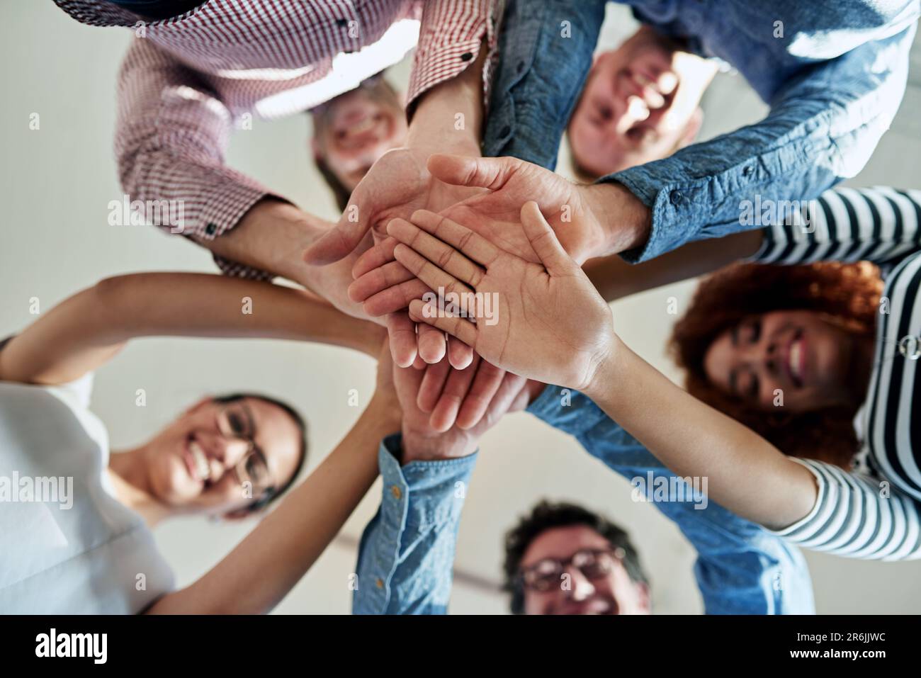 Portrait, business and group with hands together, stack and cooperation ...