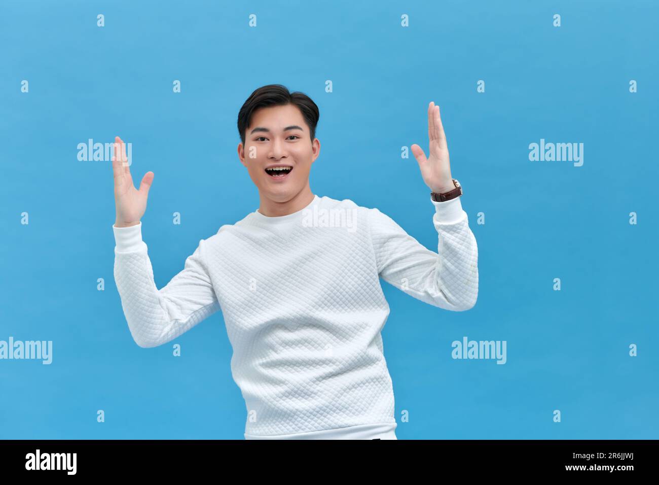 Young attractive handsome funny man excited fists up and celebrate ...