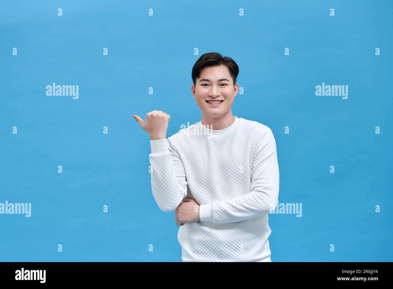 Pointing behind with her thumb hi-res stock photography and images - Alamy