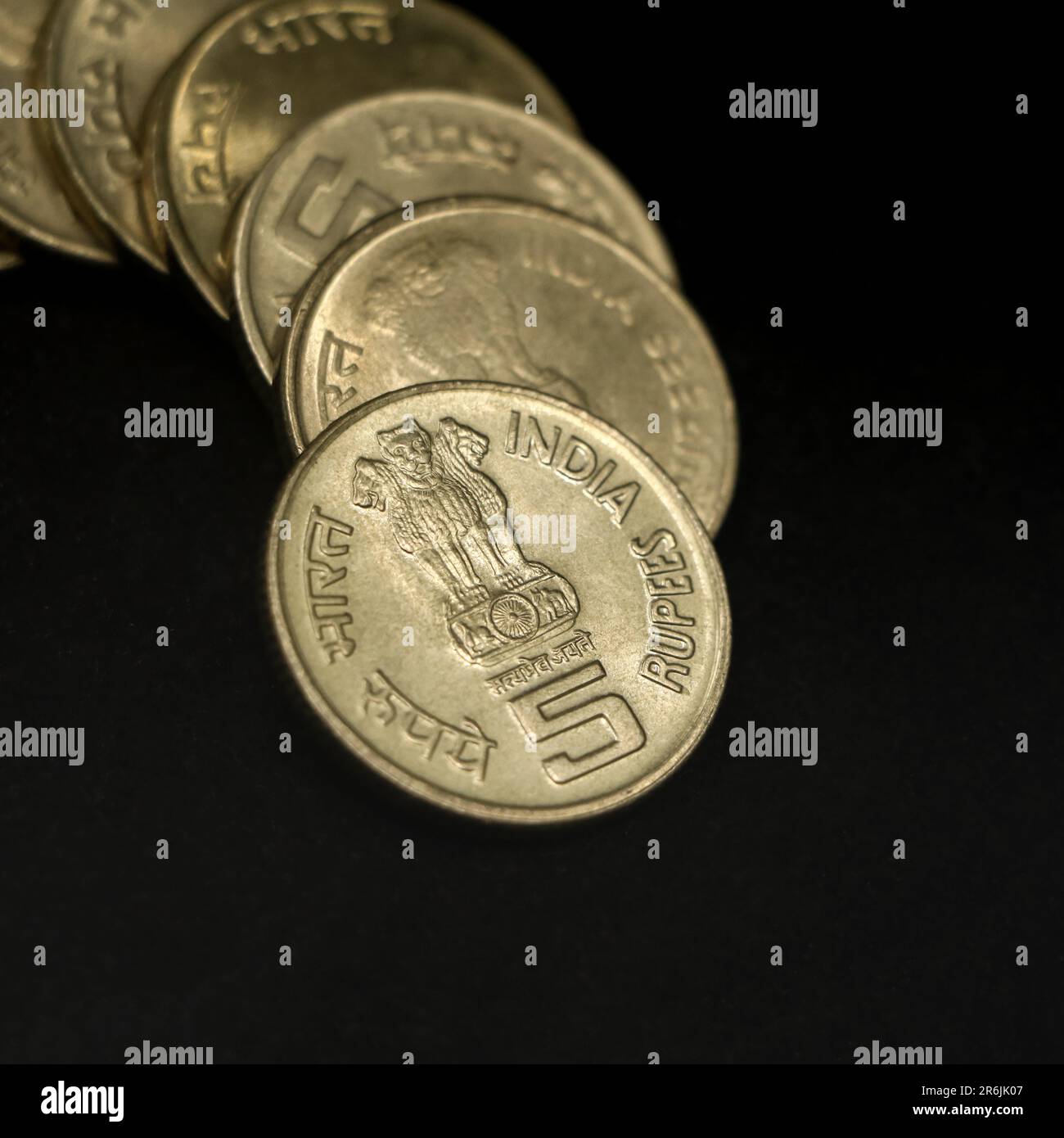 antique indian gold 5 (five) rupee coins arranged in a row shaped like ...