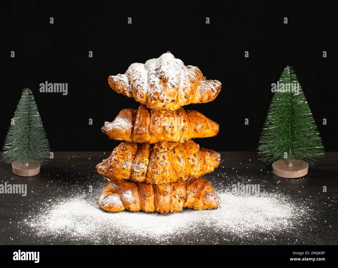 Christmas background with croissants and fir tree Stock Photo - Alamy