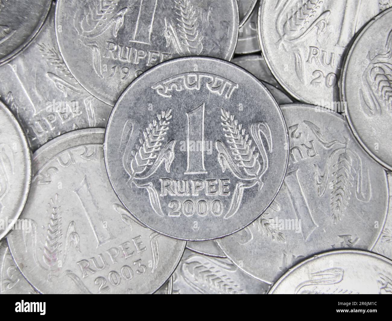 closeup top view shot of old vintage indian 1 or one rupee shiny silver ...