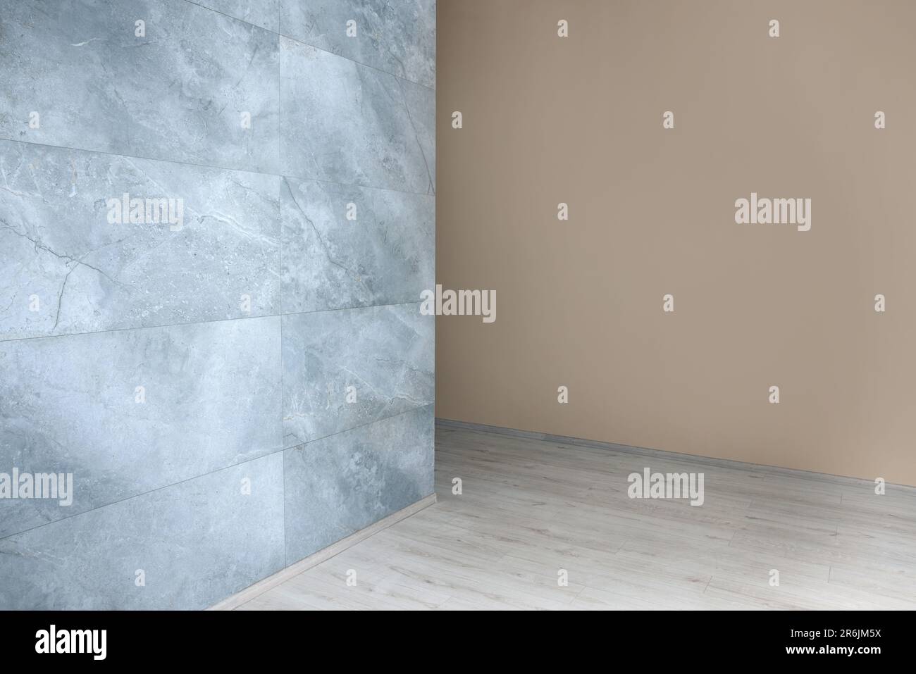 New empty room with clean stone wall Stock Photo - Alamy