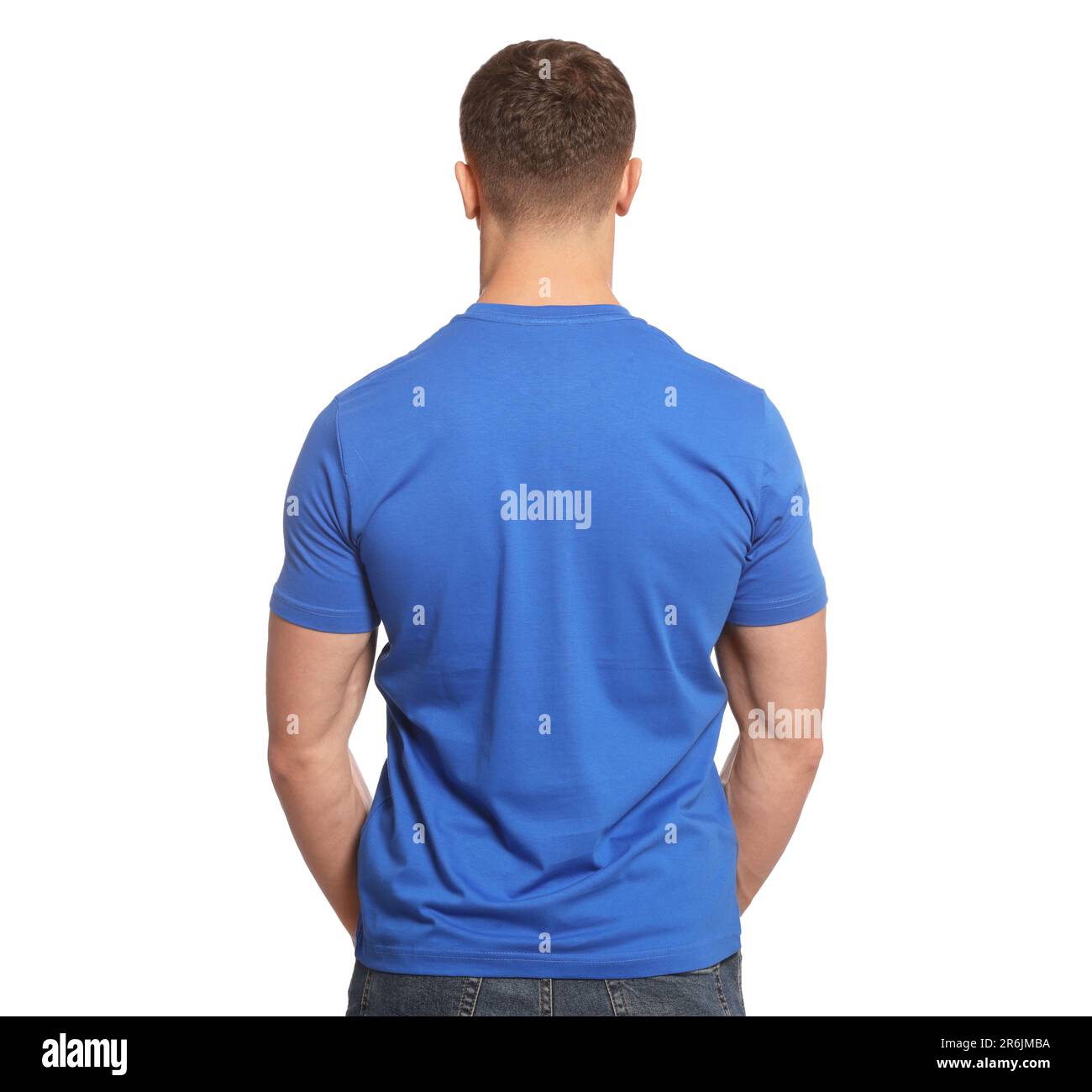 Man wearing blue t-shirt on white background, back view. Mockup for ...