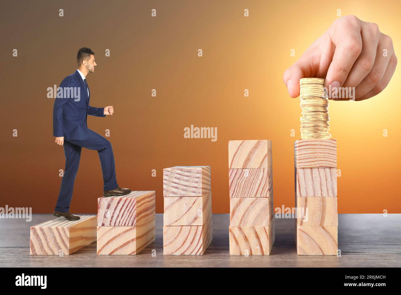 Steps to success. Businessman climbing up stairs of wooden blocks to ...