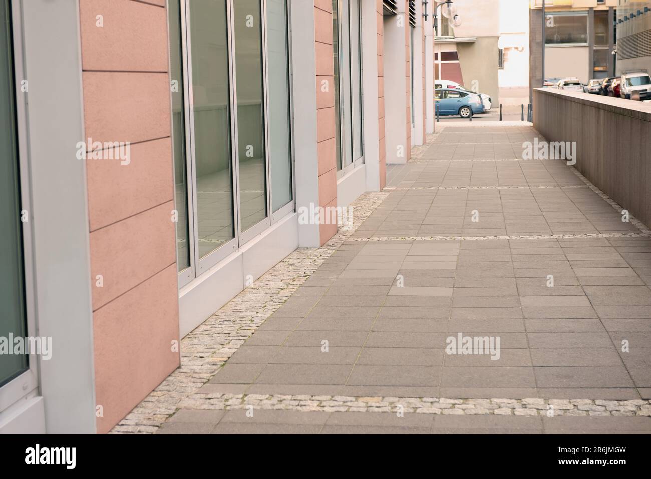 Tiled pavement near building outdoors. Sidewalk covering Stock Photo ...