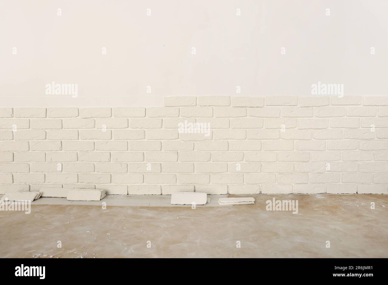 Wall with decorative tiles in room. Interior design Stock Photo - Alamy