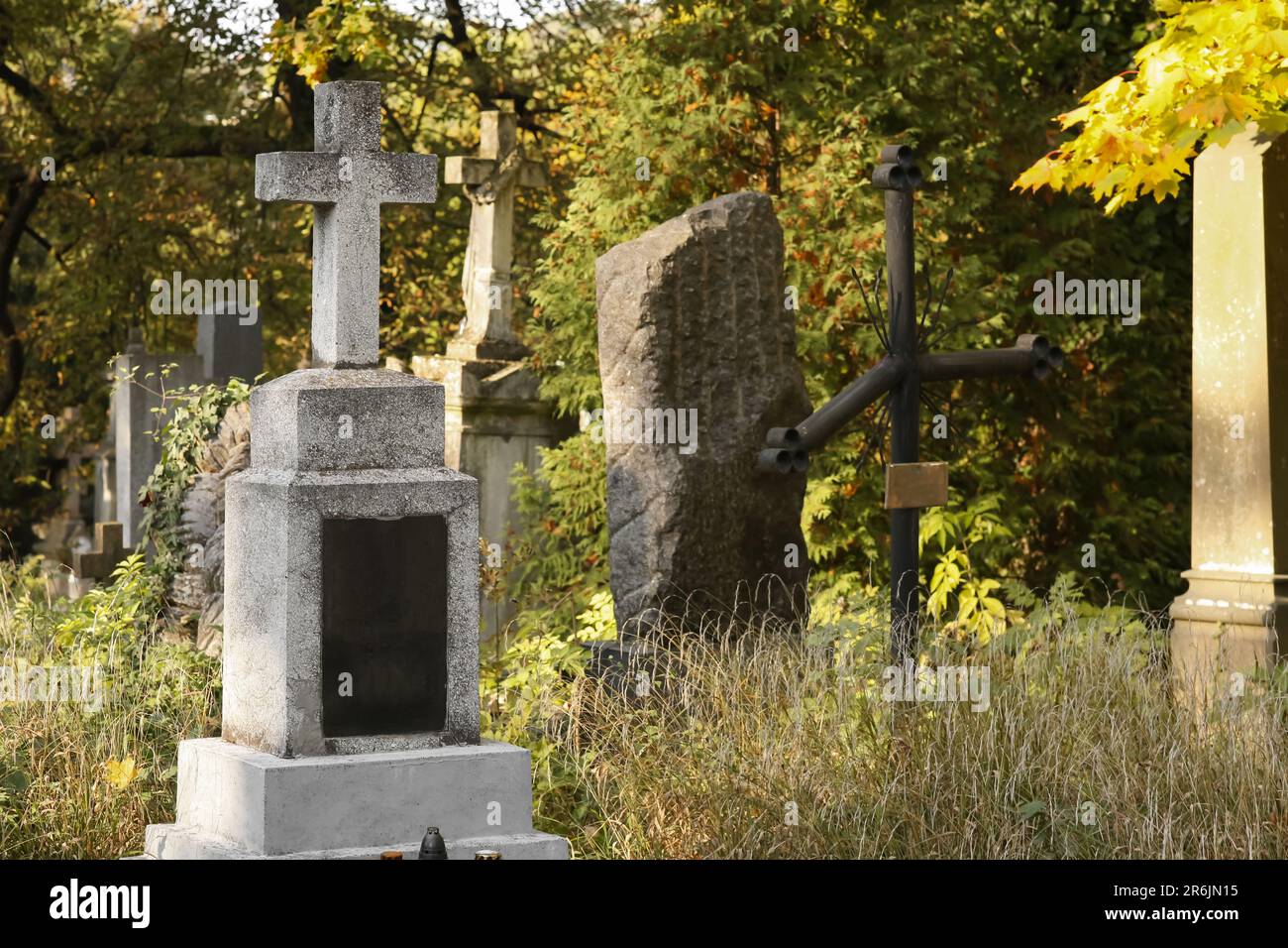 Granite tombstone with cross on cemetery. Funeral ceremony Stock Photo ...
