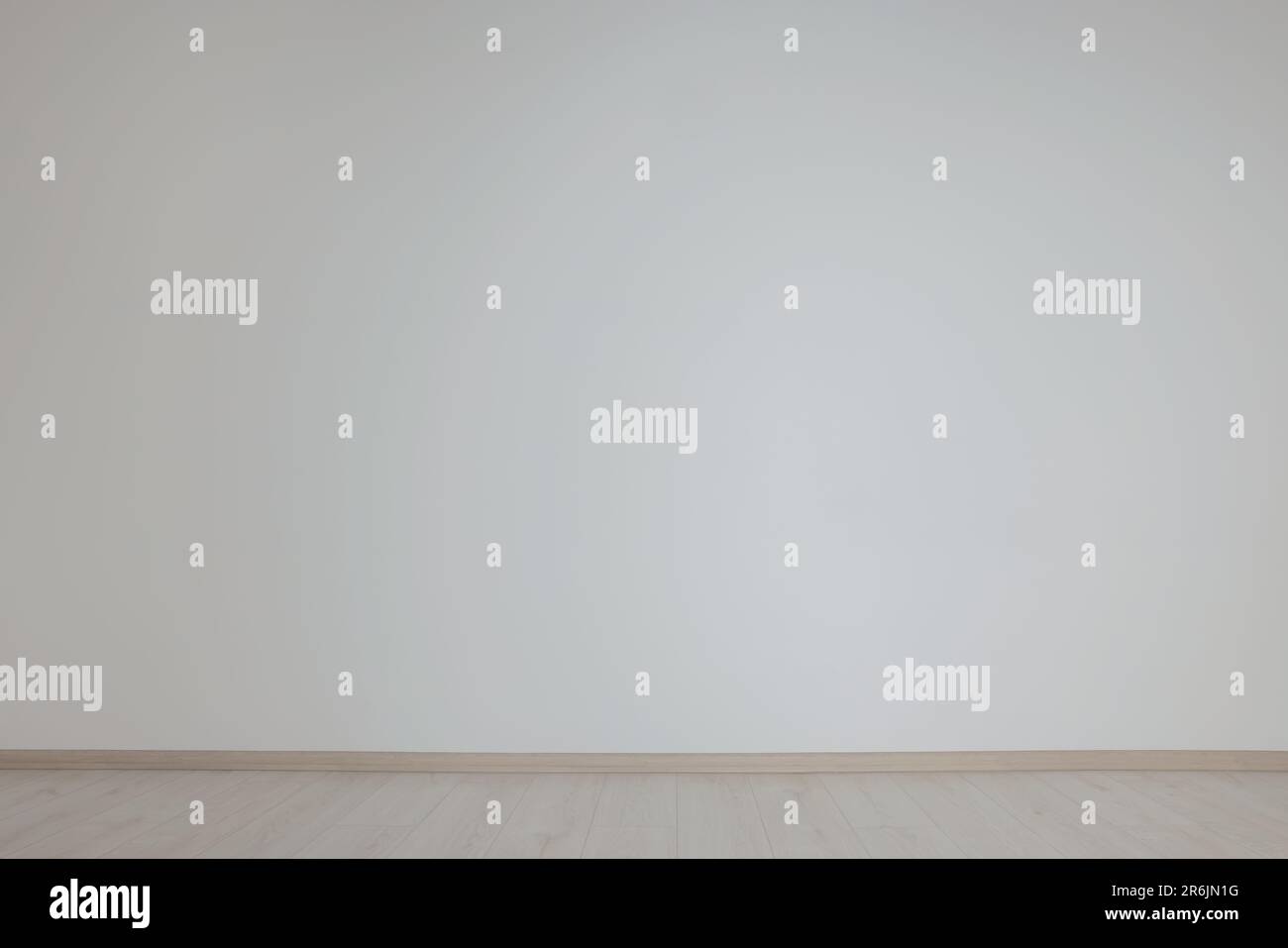 Empty renovated room with beautiful white wall Stock Photo - Alamy