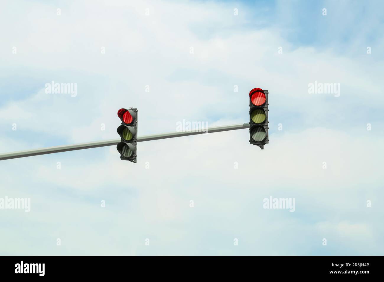 Overhead traffic lights in city. Road rules Stock Photo - Alamy