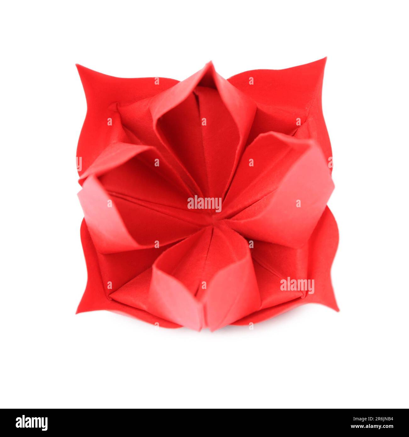 Origami art. Handmade red paper flower on white background Stock Photo ...