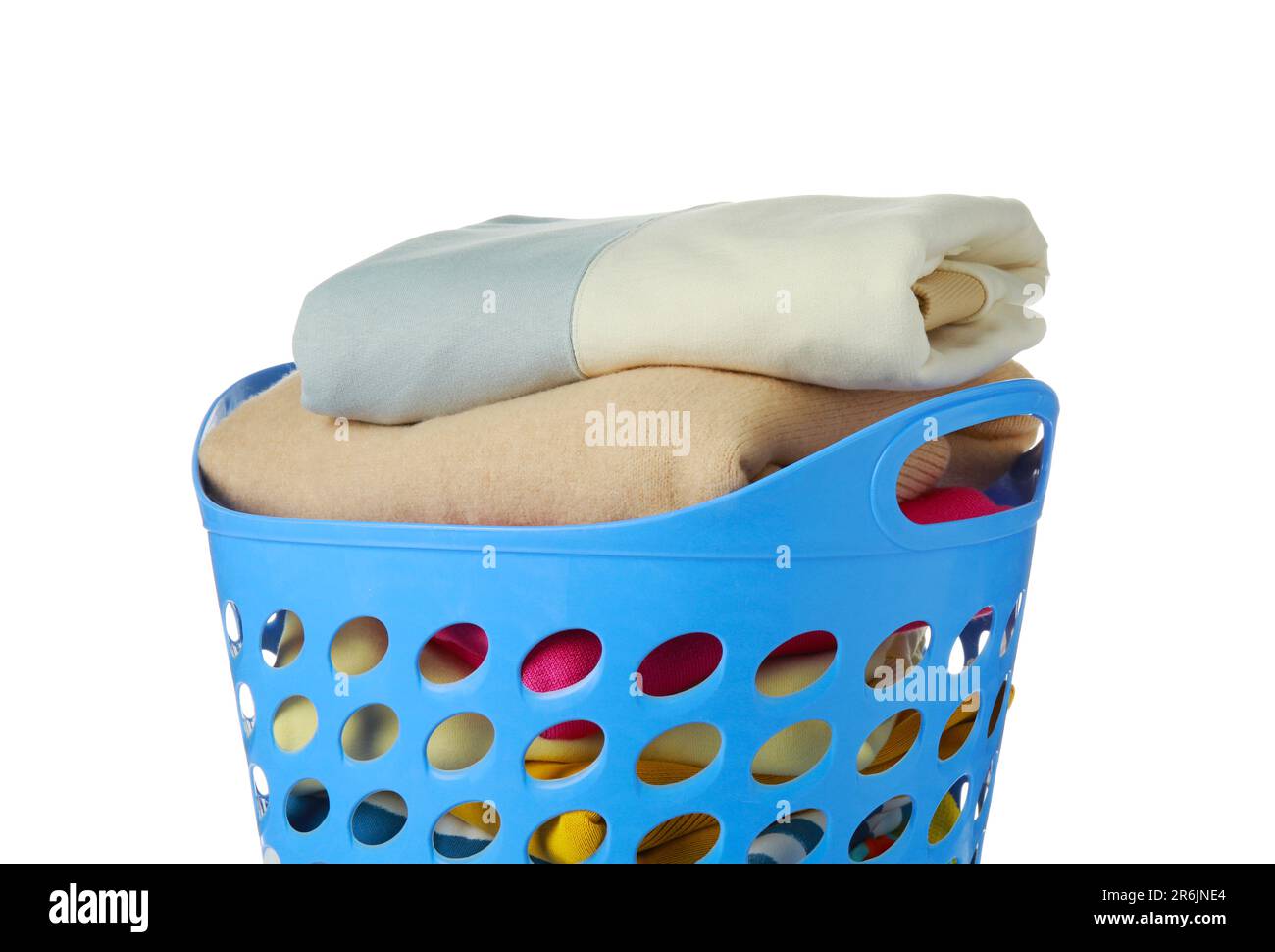 Blue plastic laundry basket with clean clothes isolated on white Stock ...