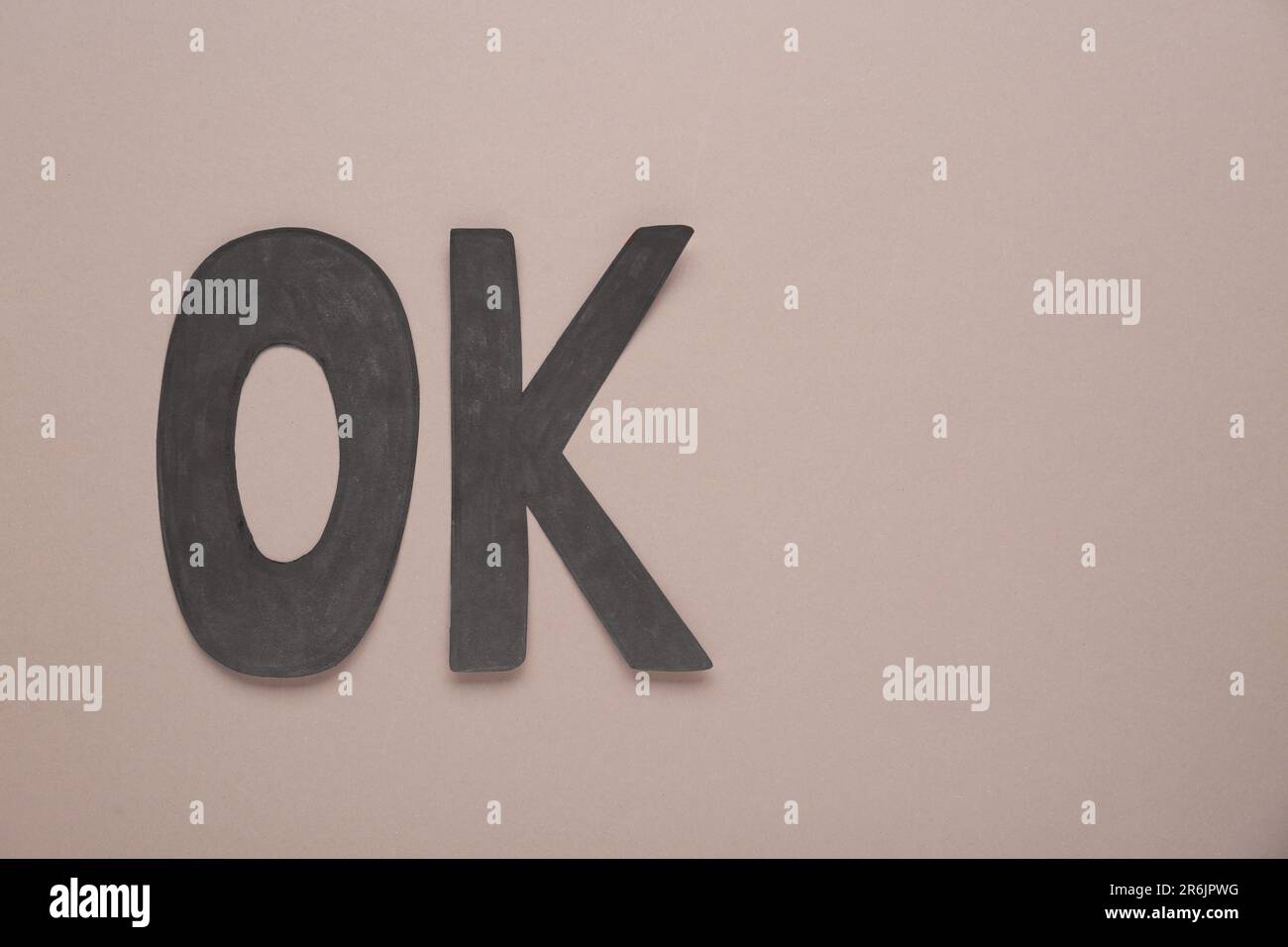 Word Okay made of paper letters on beige background, top view. Space ...