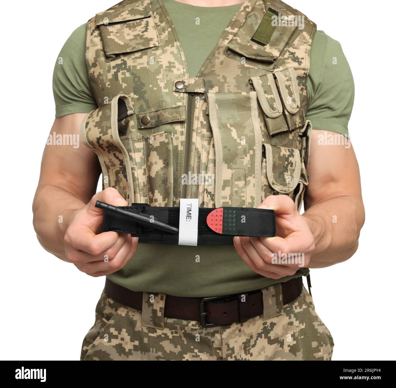 Soldier in military uniform holding medical tourniquet on white ...