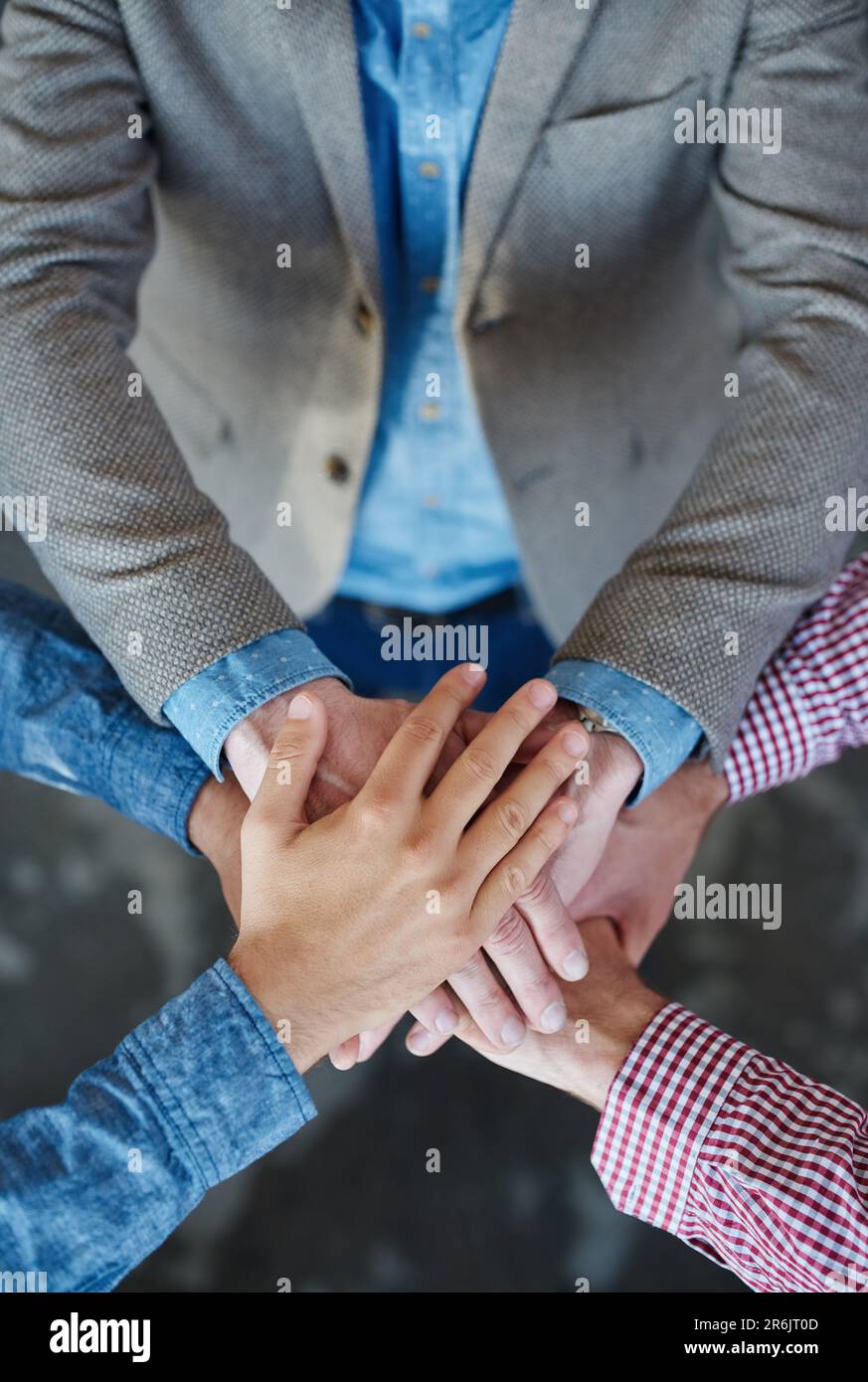 Collaboration, top view and hands together for cooperation, team ...