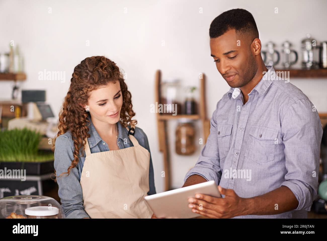 Restaurant waiters talking hi-res stock photography and images - Alamy