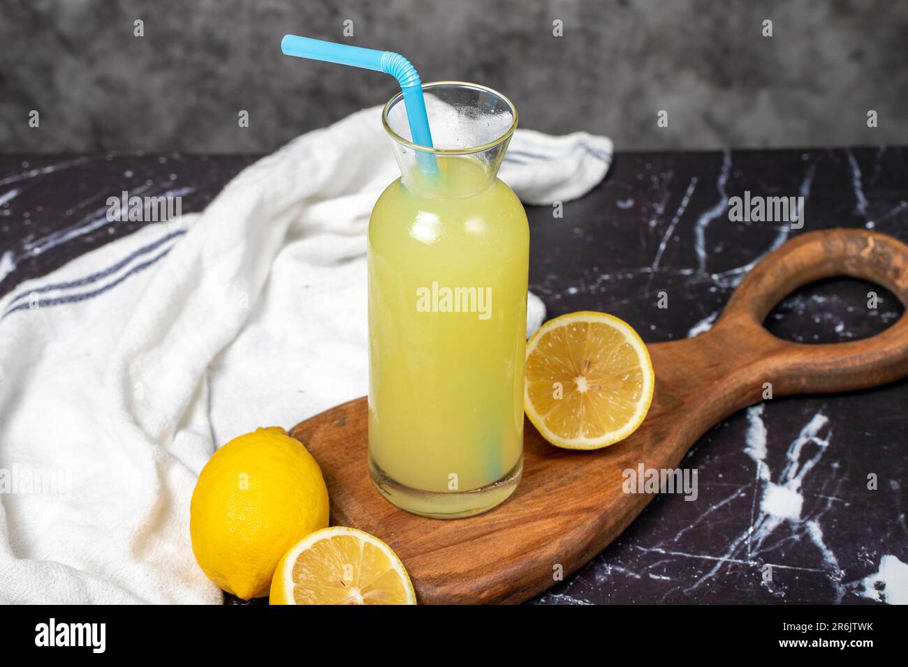 Homemade lemonade. Cool freshly made lemonade and fruits on dark ...