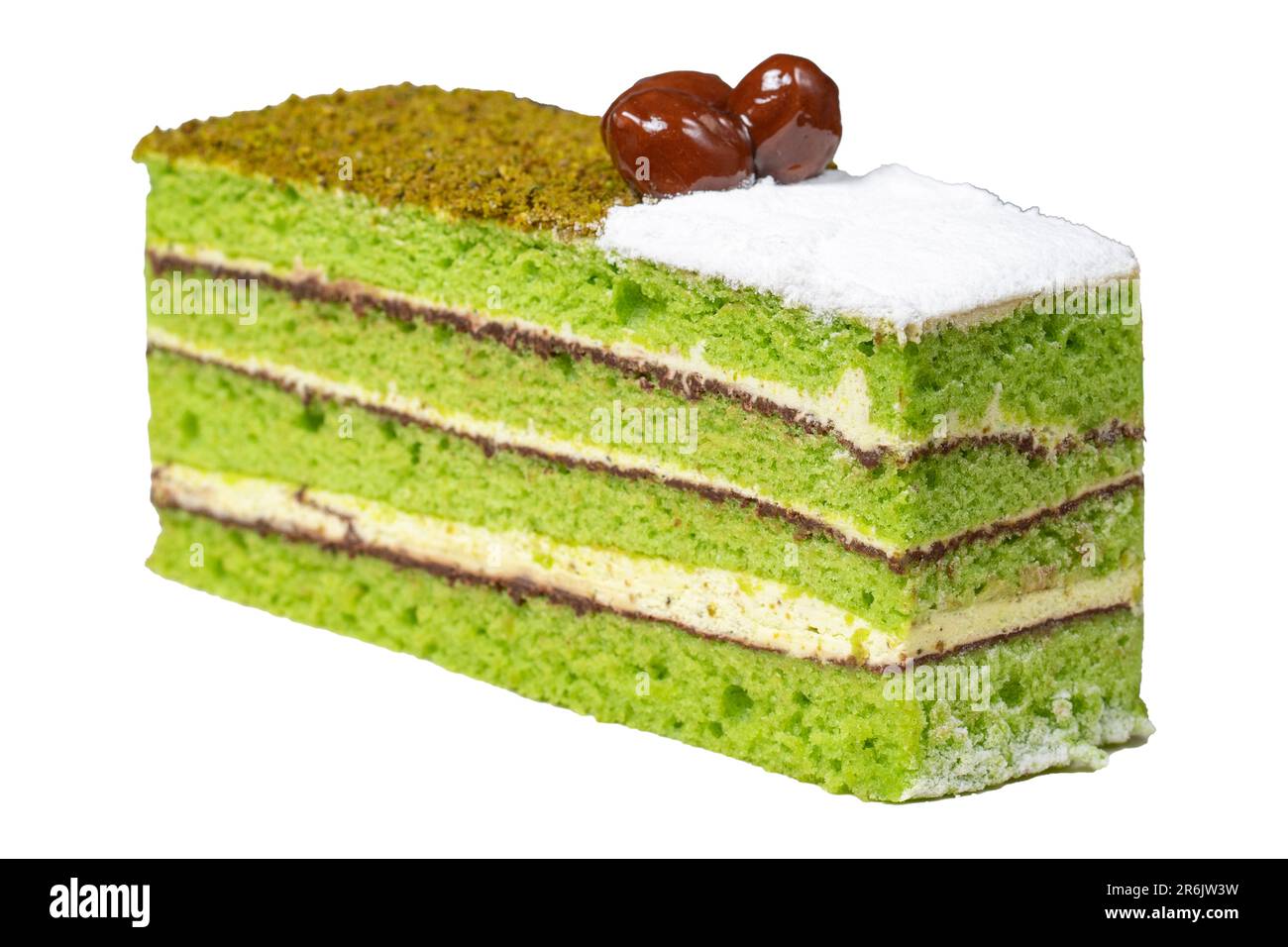 Mini slice colorful green pistachio cake. Delicious cream cake isolated ...