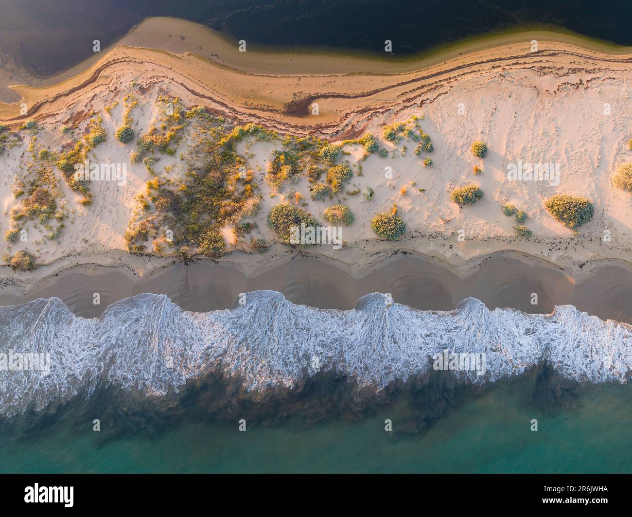 Wave patterns on the beach of a narrow sand island at Queenscliff in ...