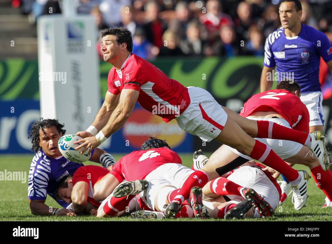 Wales’s Mike Phillips clears the ball from a ruck against Samoa during ...