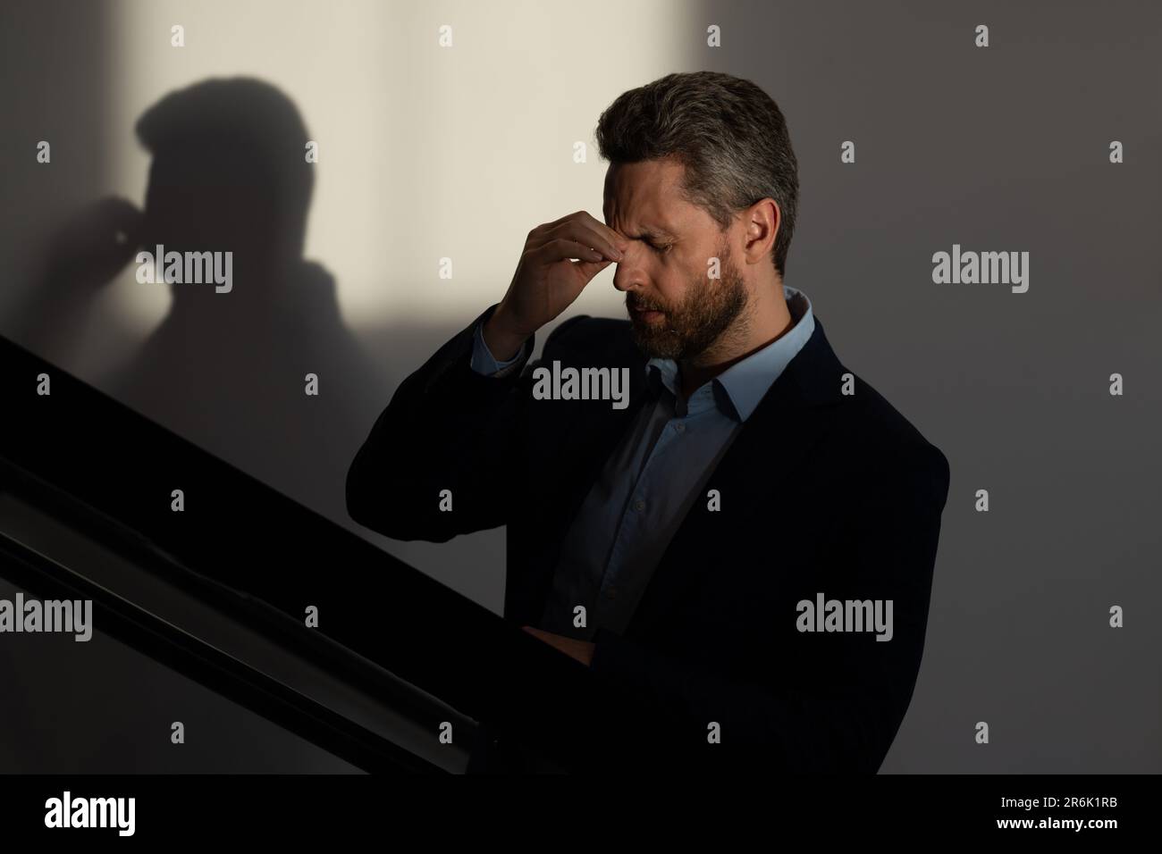 Tired man feel pain head. Close up portrait of stressed man suffer from ...