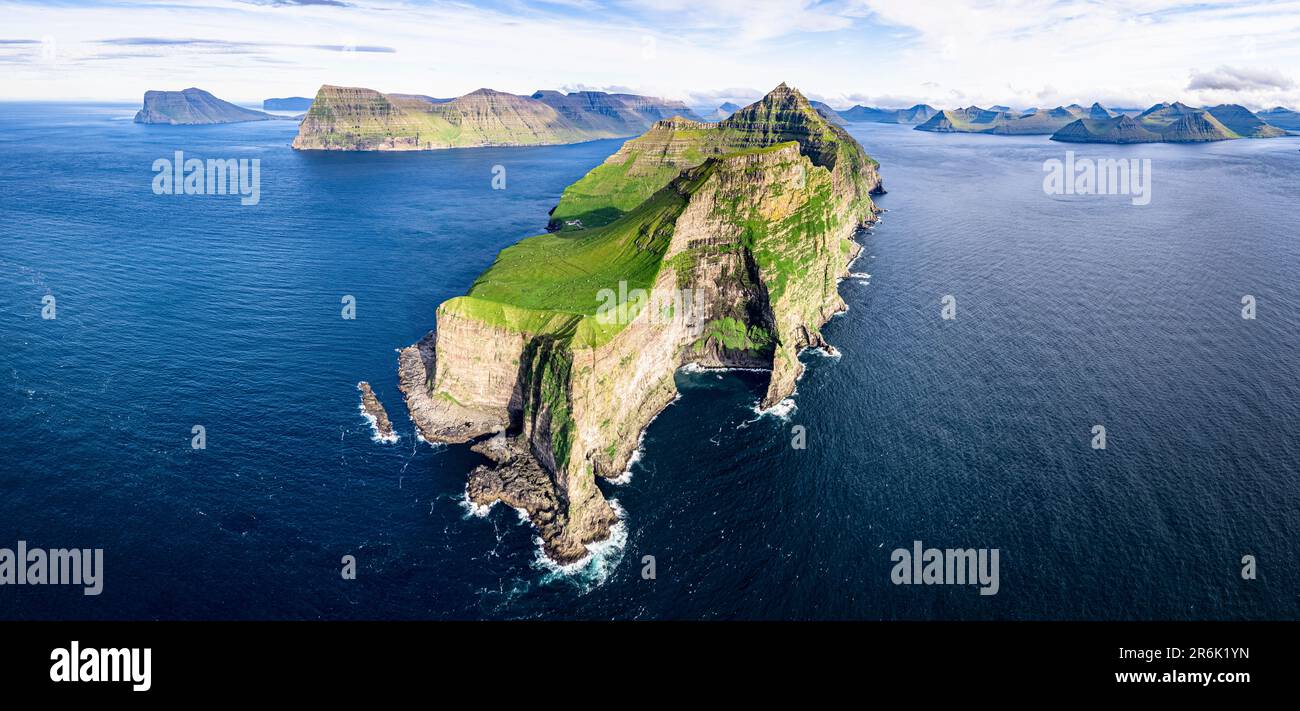 Aerial view of Kallur lighthouse on majestic cliffs washed by the blue ...