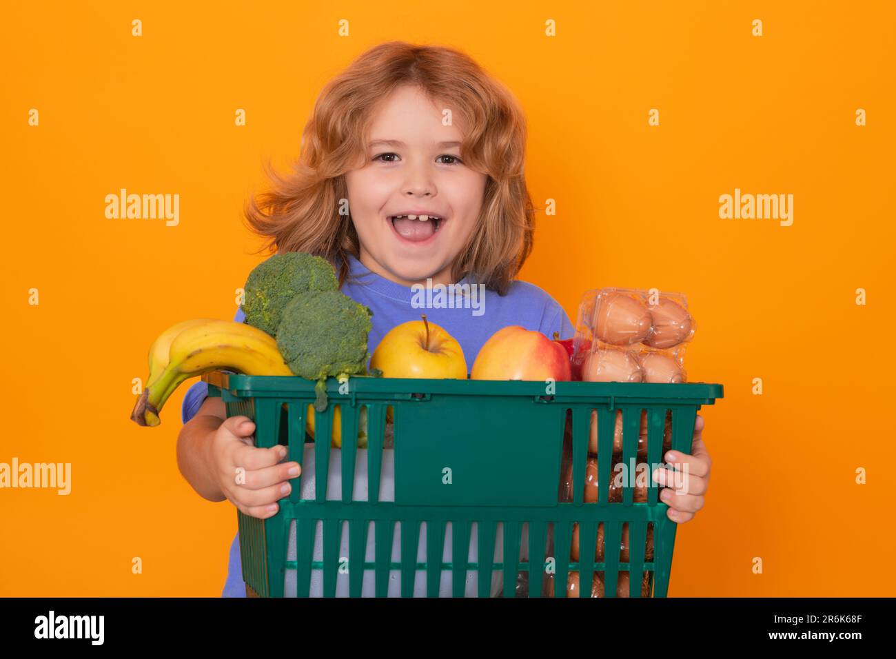 Sale and discount. Kid at vegetable supermarket. Child with shopping ...