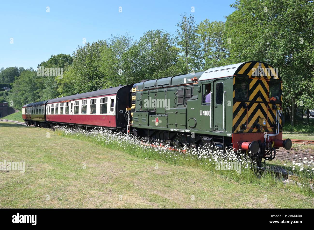 A class 09 diesel locomotive pulls two carriages Stock Photo - Alamy
