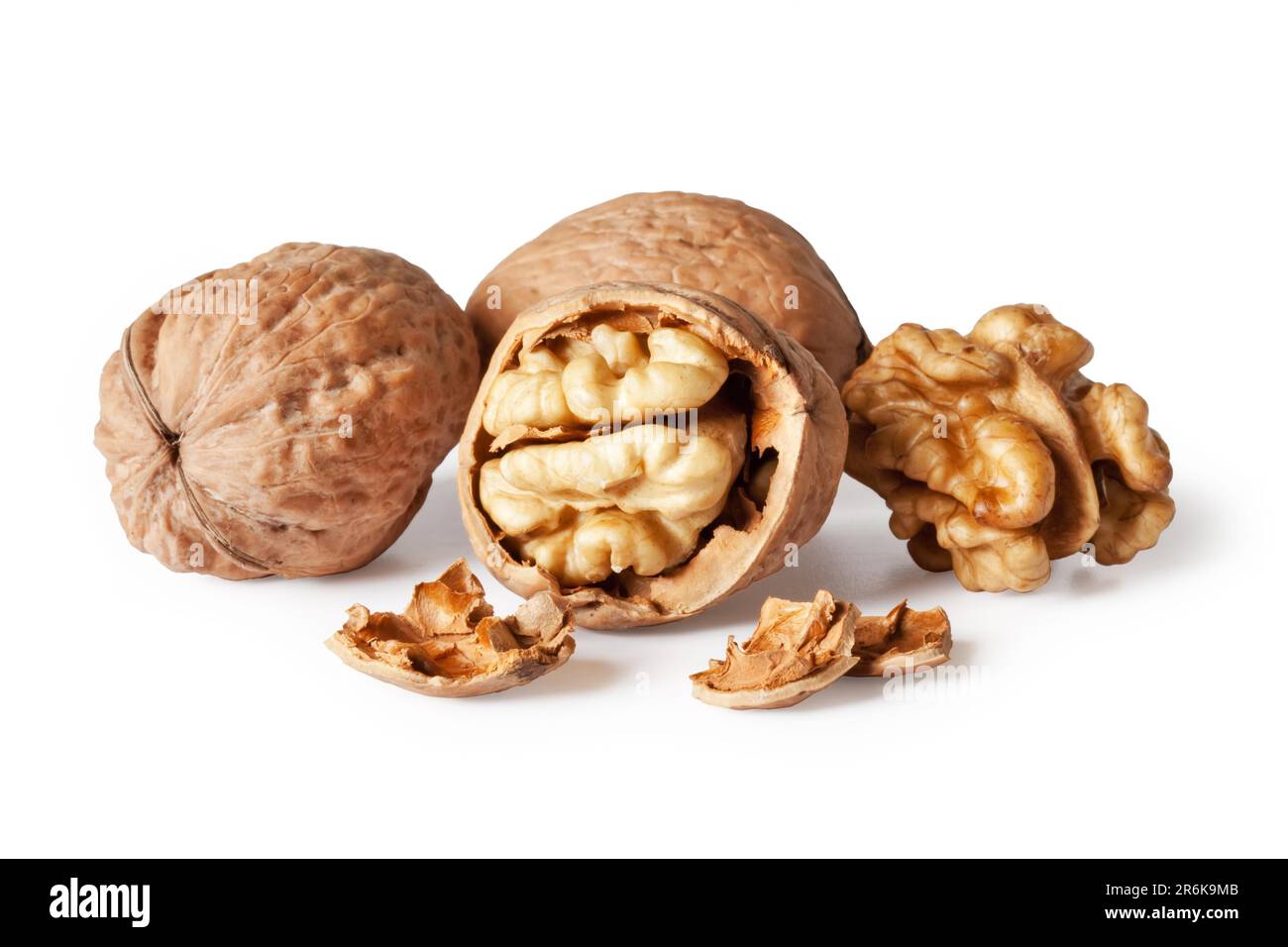 walnut and a cracked walnut isolated on the white background Stock ...