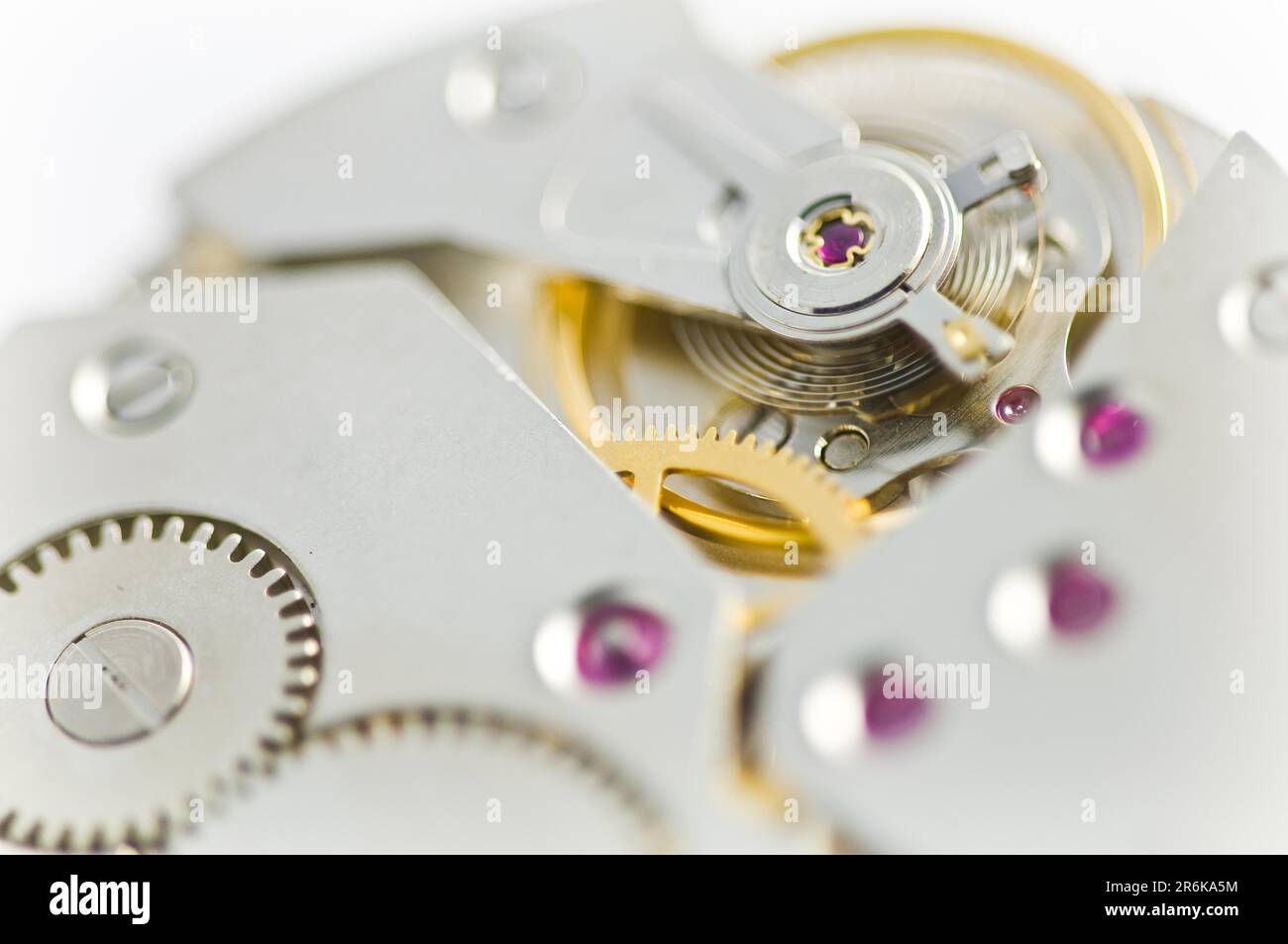 Open precision movement with large and small gears Stock Photo - Alamy
