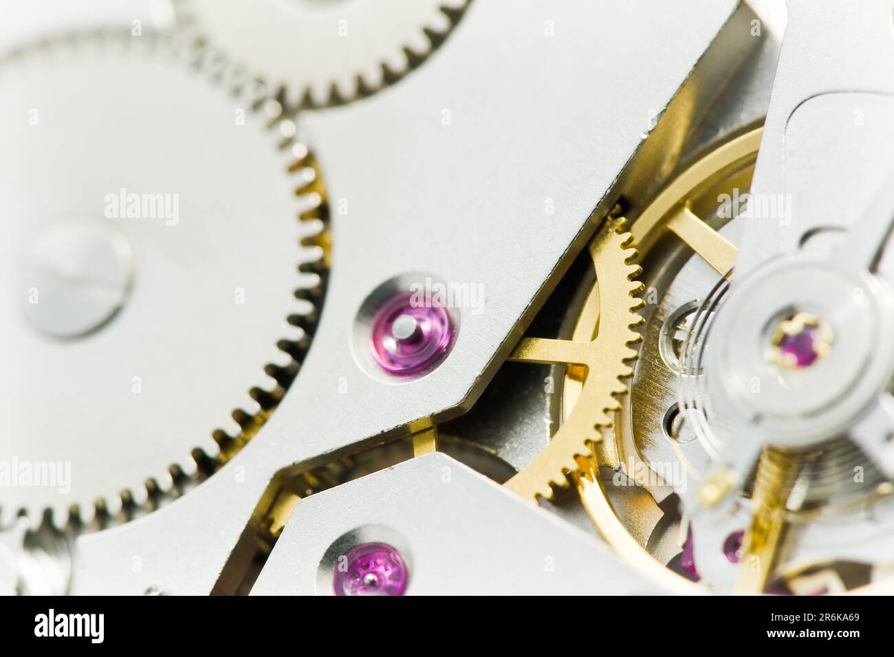 Open precision movement with large and small gears Stock Photo - Alamy