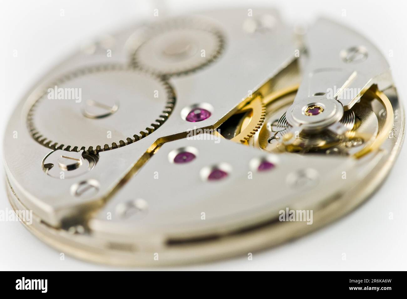 Open precision movement with large and small gears Stock Photo - Alamy