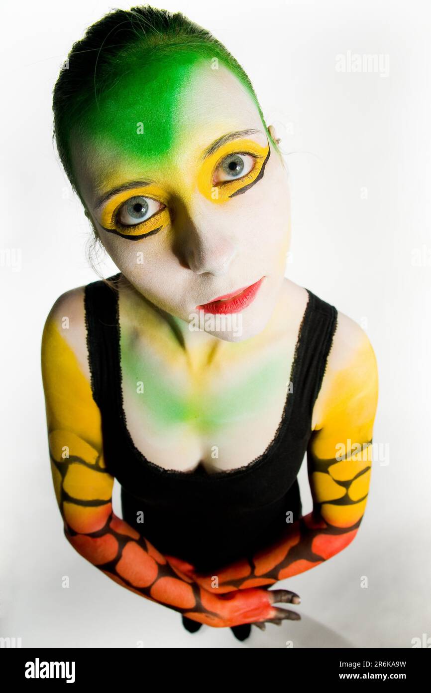 Colourful painted woman from above from wide angle perspective with big ...