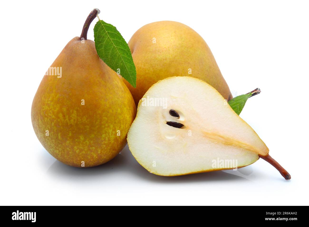 Yellow sliced pears with green leaf isolated on white background Stock ...