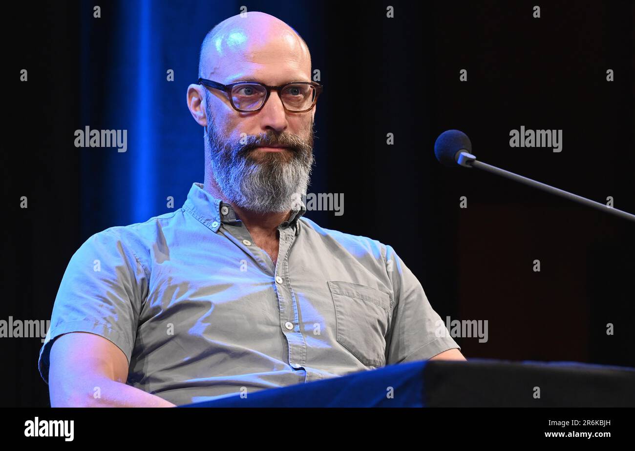 Cologne, Germany. 09th June, 2023. Actor Andreas Grötzinger sits on the ...