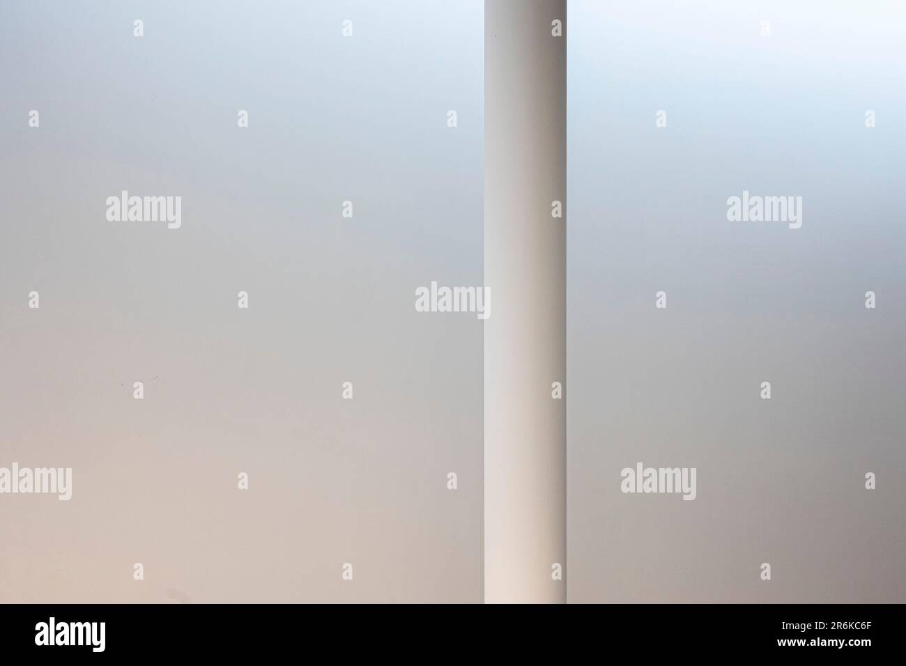 A close-up view of two white walls with colorful lights on them ...