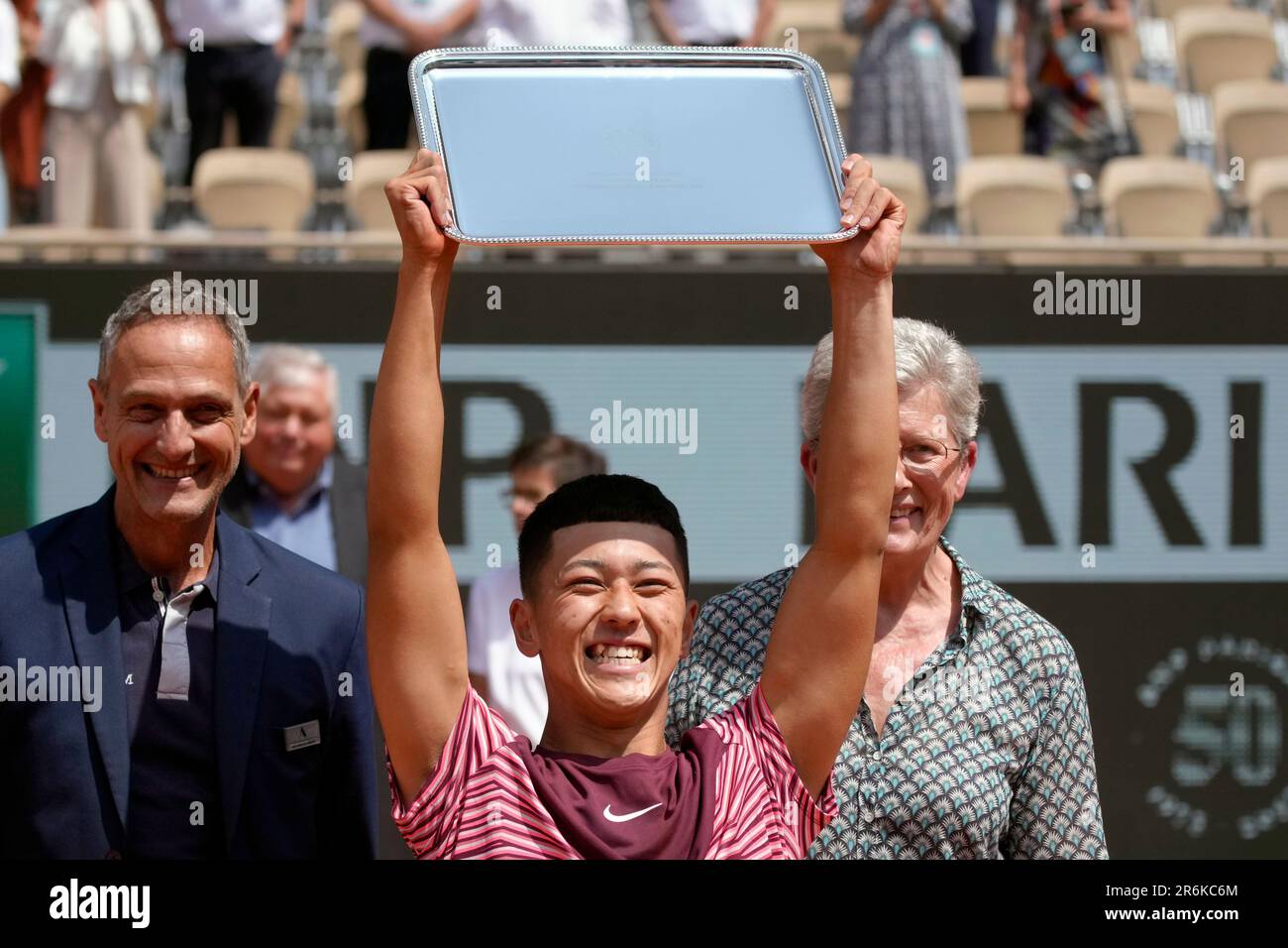 Japan's Tokito Oda holds the trophy as he celebrates after beating ...