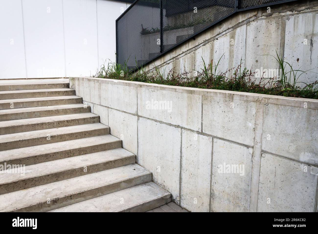 Close up and details of railing and concrete stairs of a modern ...