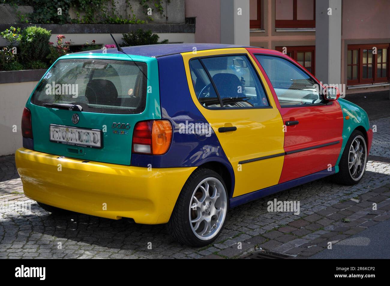 Four-coloured car, VW Polo Harlequin Stock Photo - Alamy
