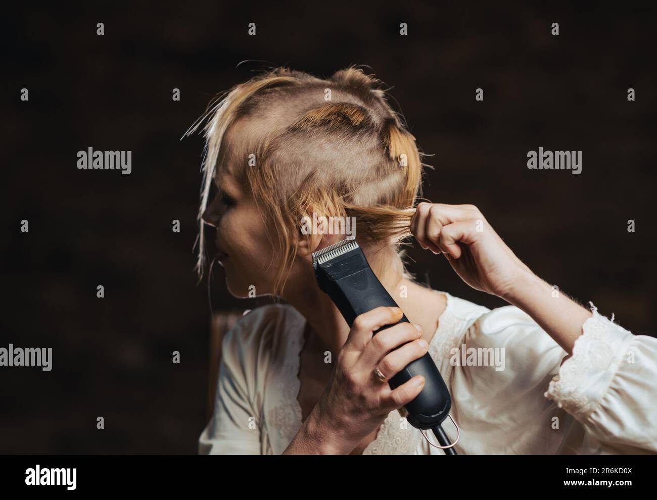 Woman shaves head bald hair hi-res stock photography and images - Alamy