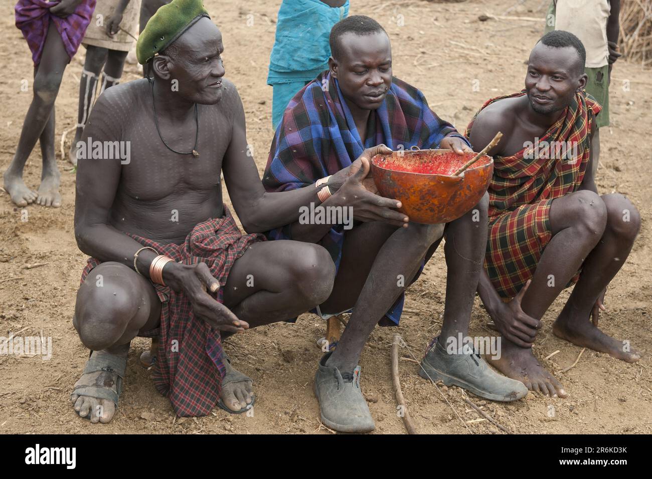 Nyangatom men share a calabash with cow's blood, Omo River Valley ...