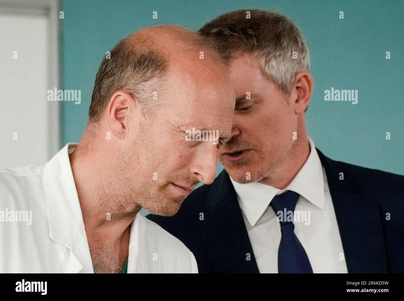 Surgeon Sergio Alfieri, left, listens to pope's spokeperson Matteo ...