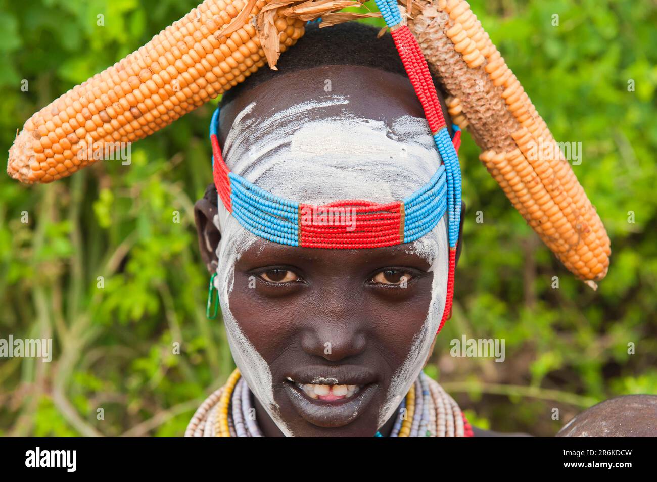 Karo woman with colourful necklaces and headdresses made of maize, Omo ...
