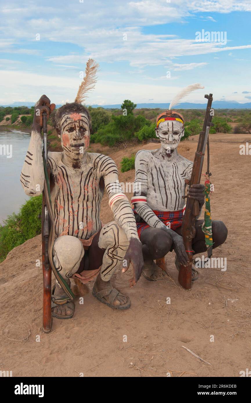 Karo warrior with body painting and rifle, Omo Valley, Southern ...