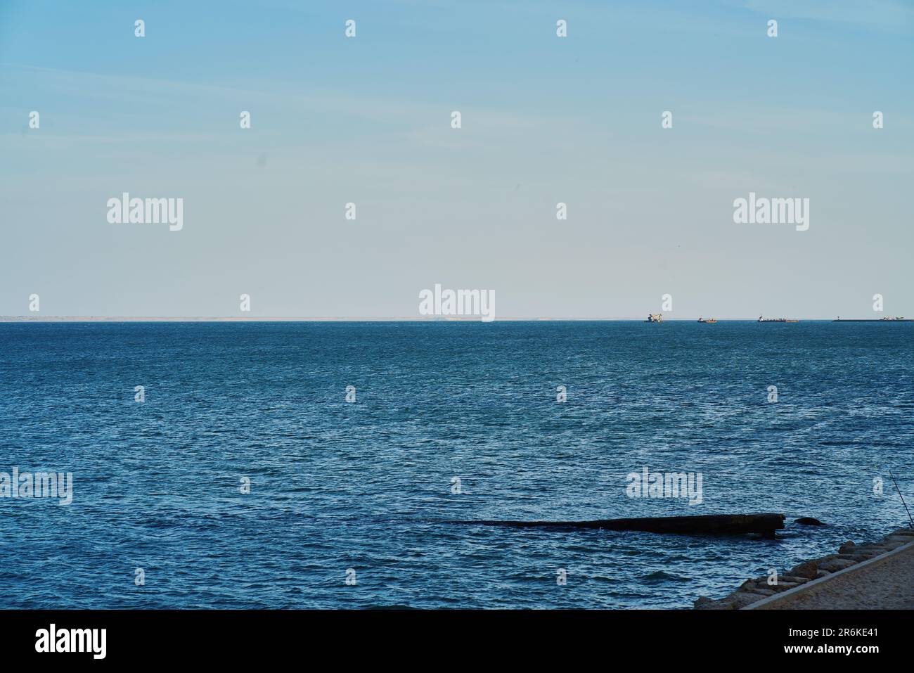 nice blue Sea and yellow beach in Dakhla city Stock Photo - Alamy