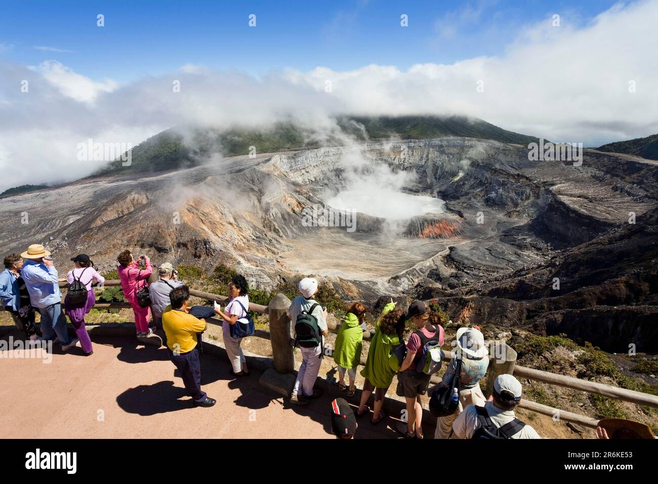 Tourists at the crater of Poas Volcano, Poas National Park, Costa Rica ...